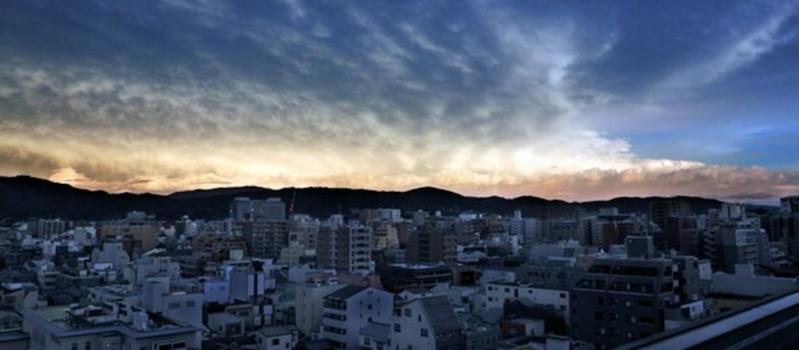 A fantastic scene appears in the sky seen from kyoto city. the clouds ...