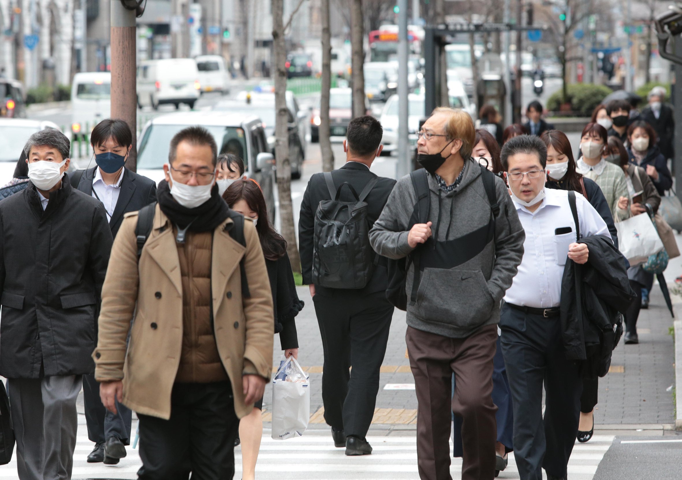 "many people still wear them," a long way to mask removal : first day ...